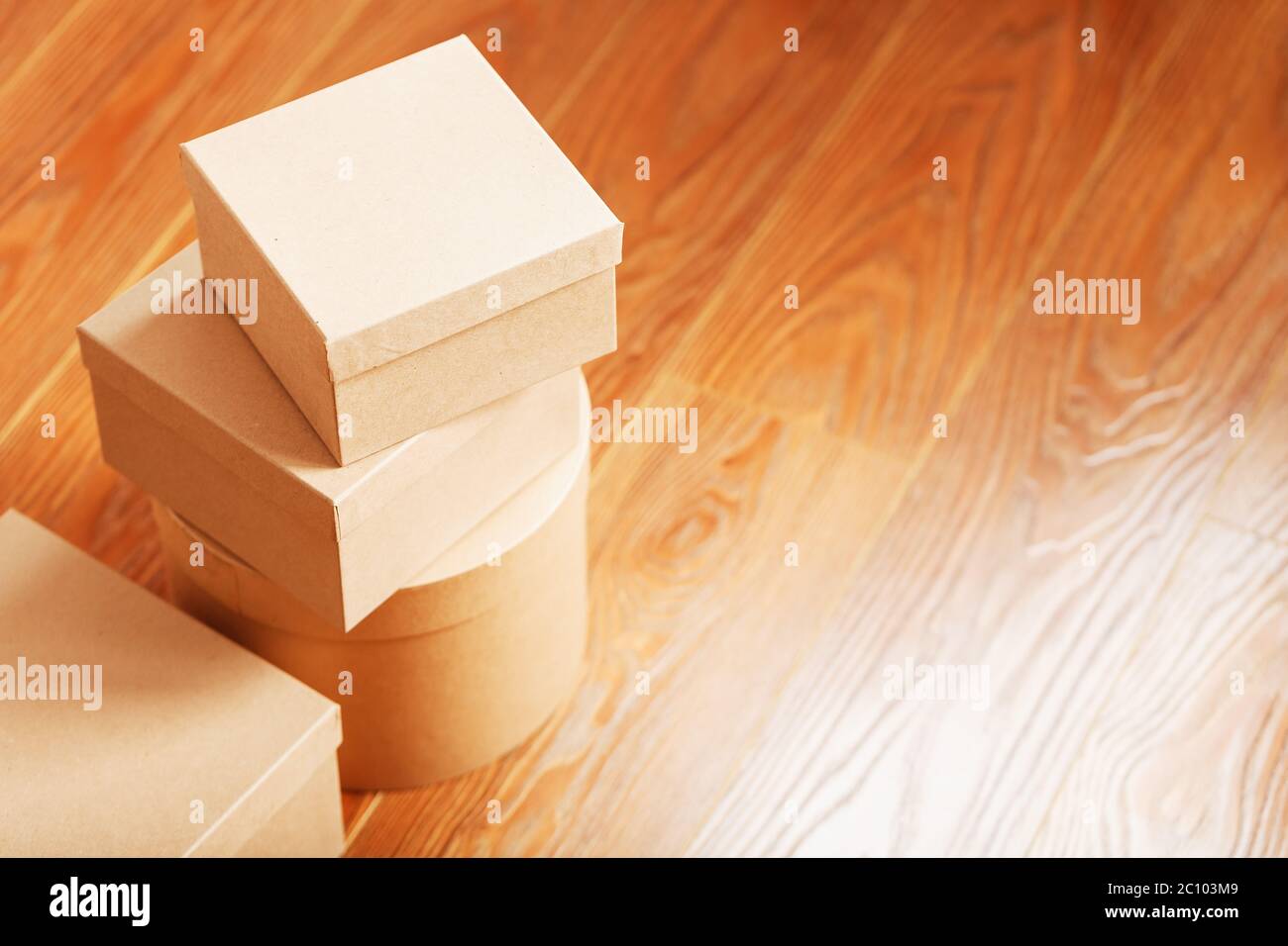 Cardboard mail boxes on the wooden floor of different shapes Stock ...