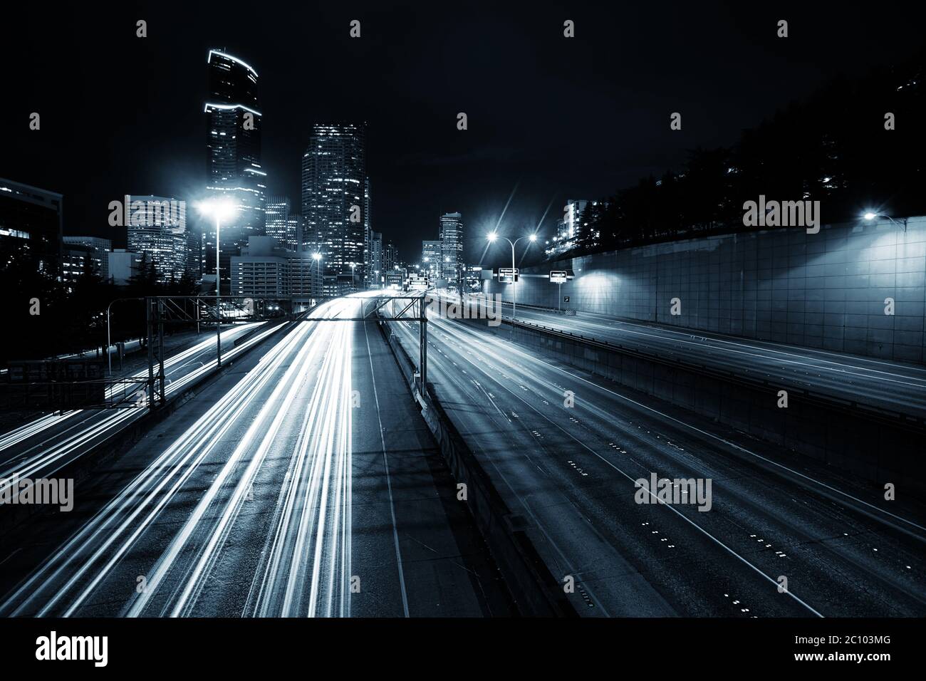 traffic on road and modern office buildings in downtown of seattle at ...