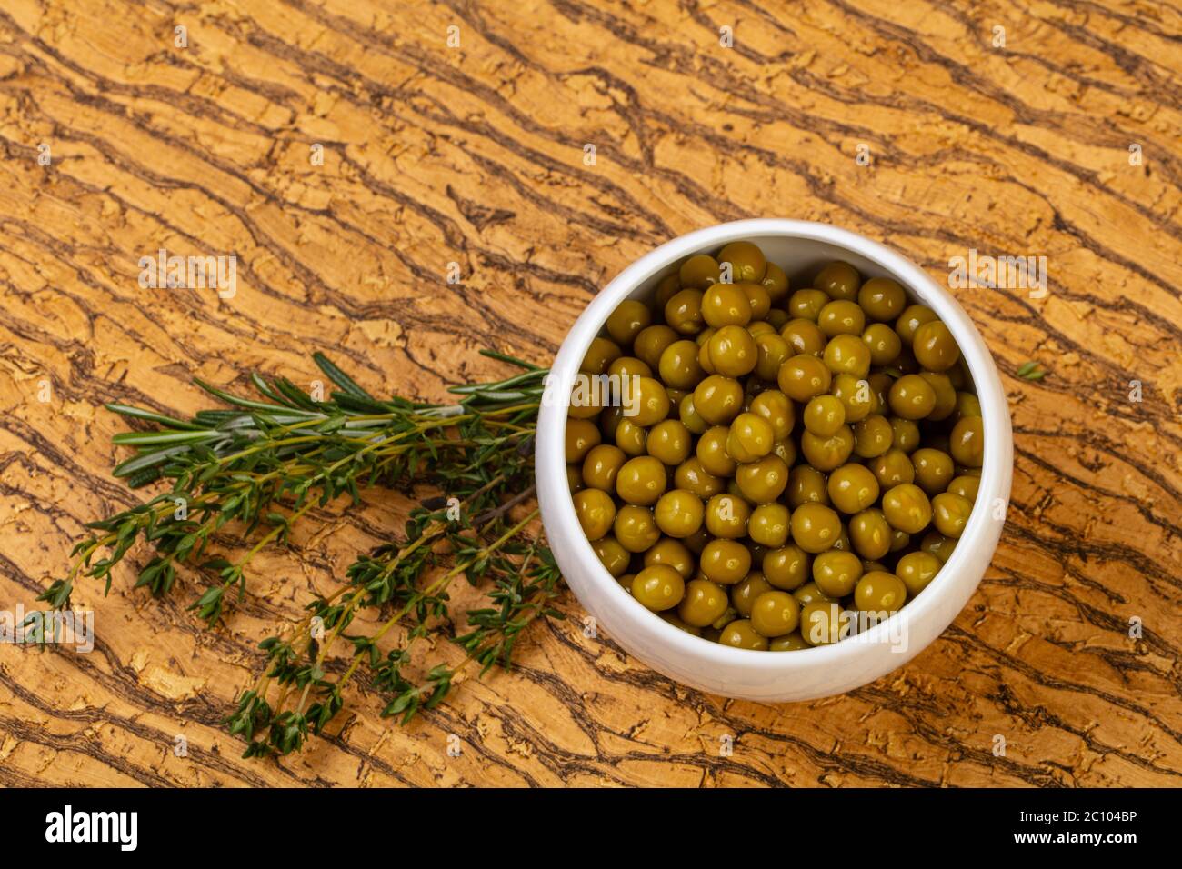 Marinated Pickled green peas in the bowl Stock Photo - Alamy