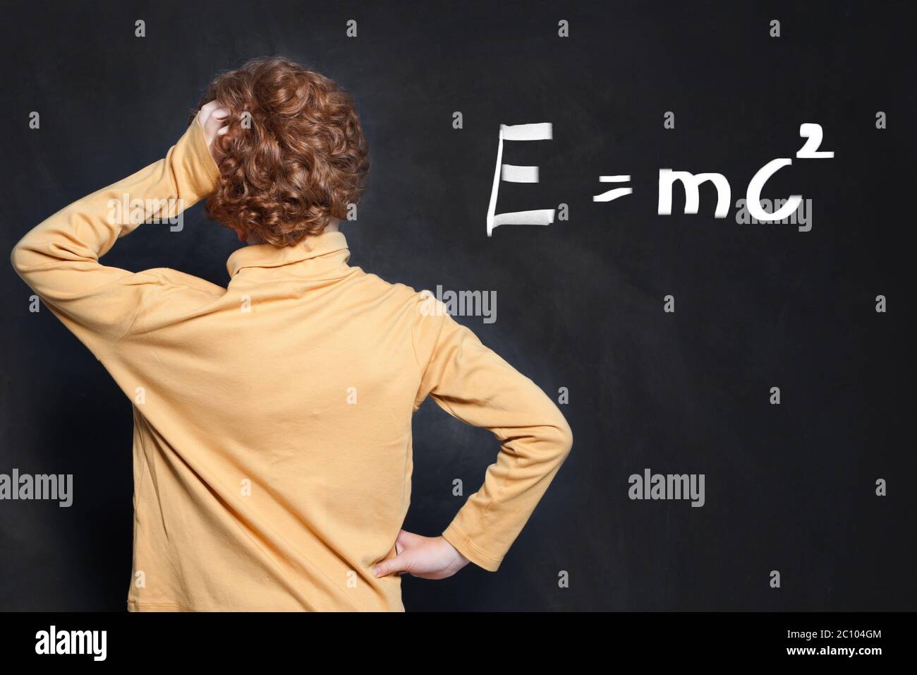 Thinking child and science formula on blackboard background Stock Photo ...