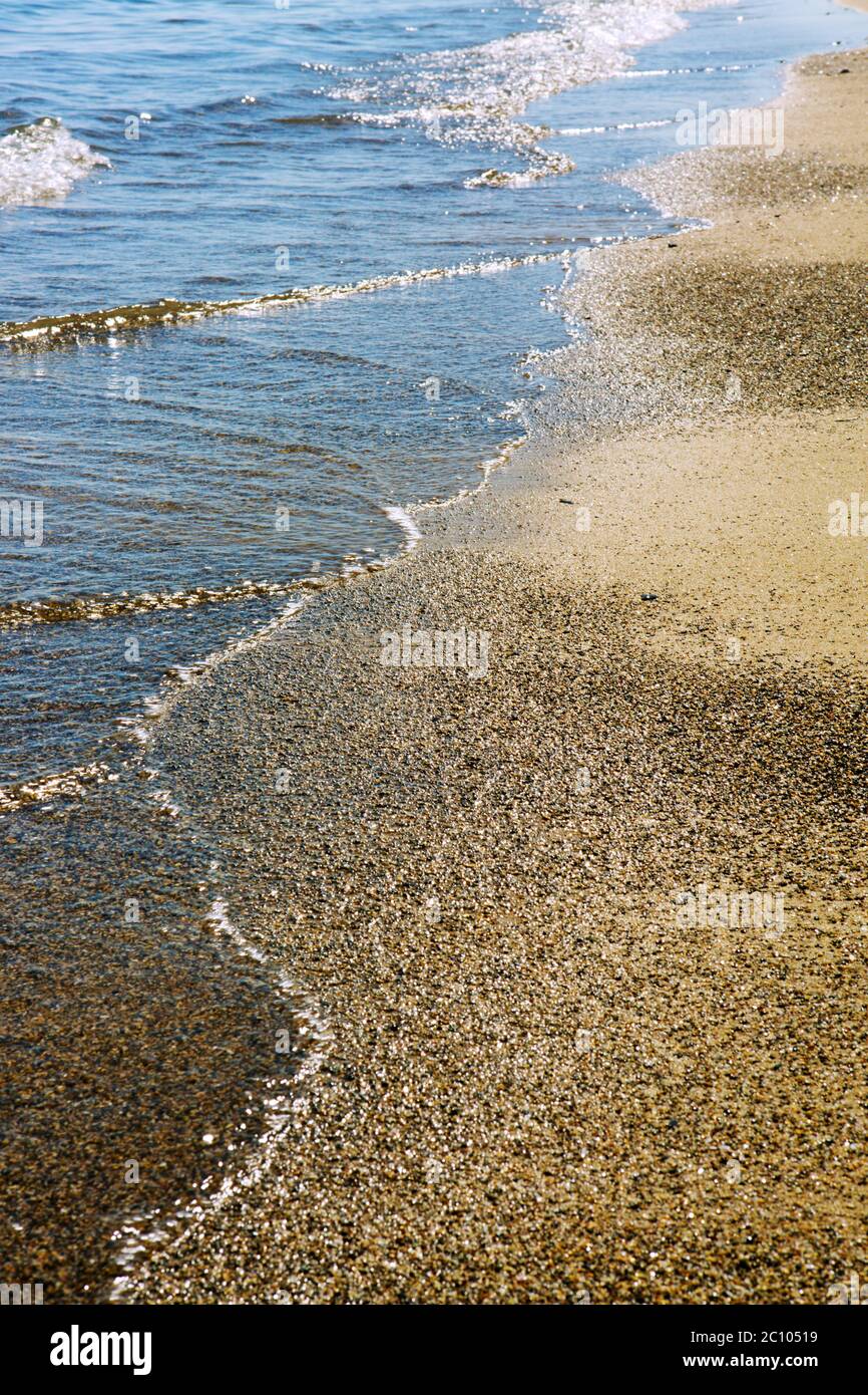 Sea wave and beach Stock Photo - Alamy