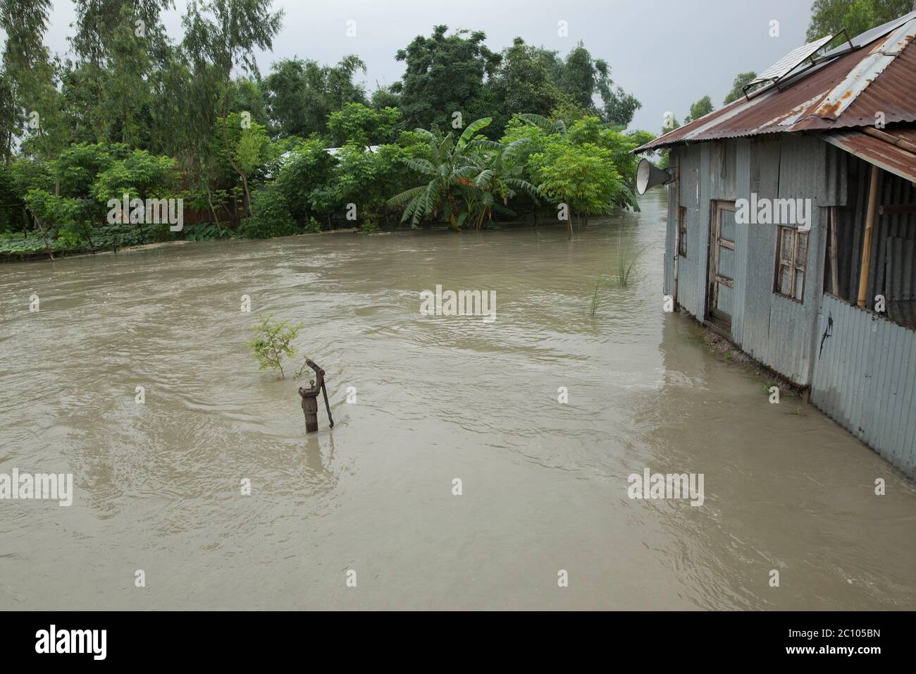 Submarge tubewell in flood affected area of Bangladesh Stock Photo - Alamy