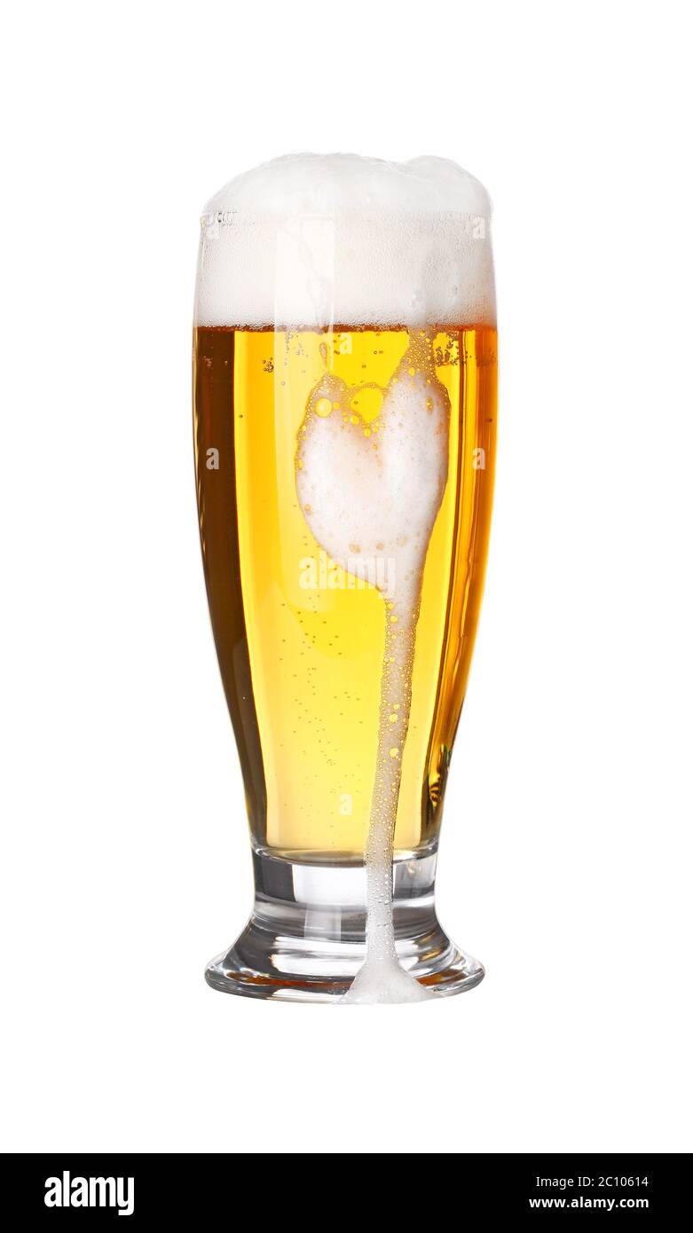 Close up one full high glass of lager beer with froth and bubbles ...