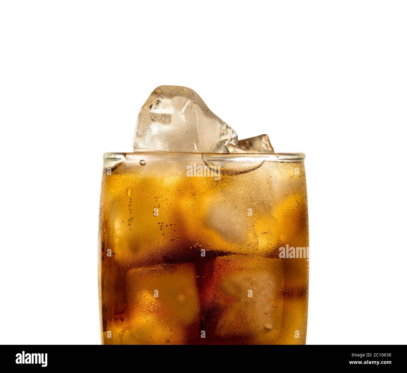 Close up one big high glass of cold cola soft drink with ice cubes ...
