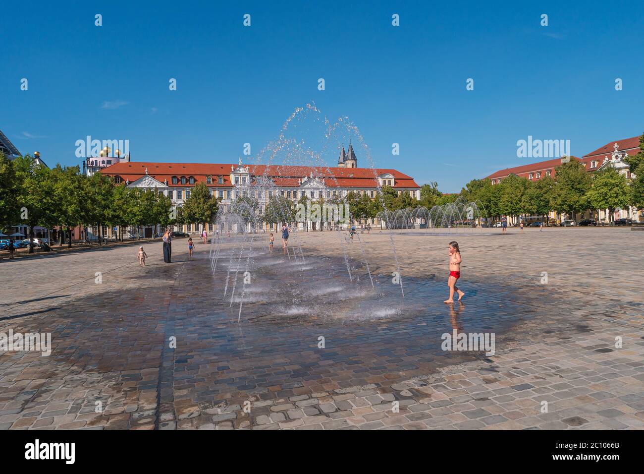 Major Cathedral Square (Domplatz) with kids playing in fountains in ...