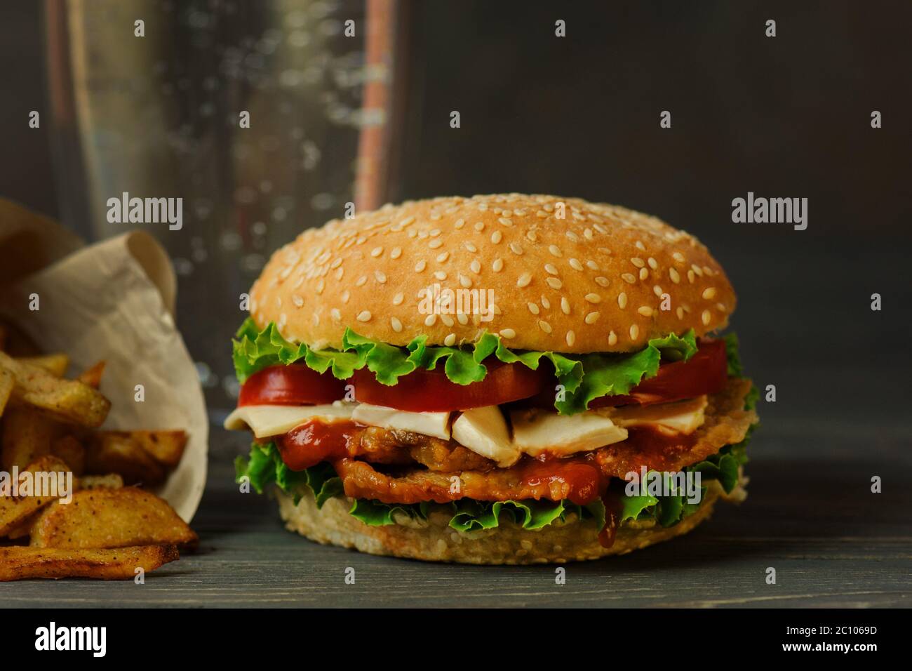 Preparation of delicious burger in a restaurant. Delicious burger on ...