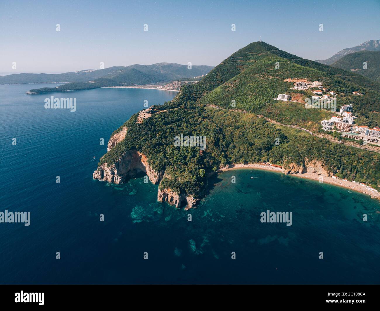 Mogren Beach, near the old town of Budva, in Montenegro. The ancient ...