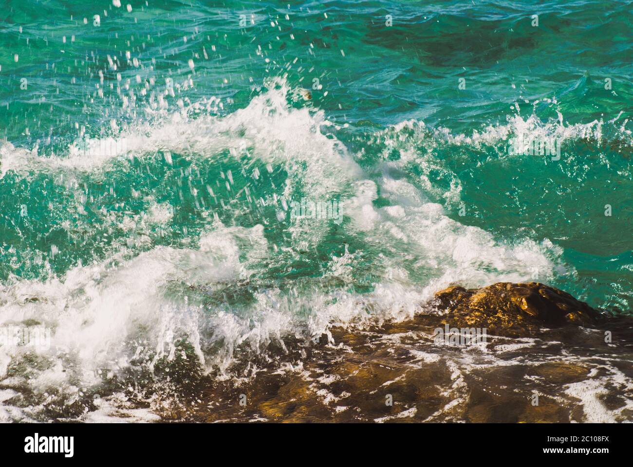 Photo of beautiful clear turquoise sea ocean water surface with ripples ...