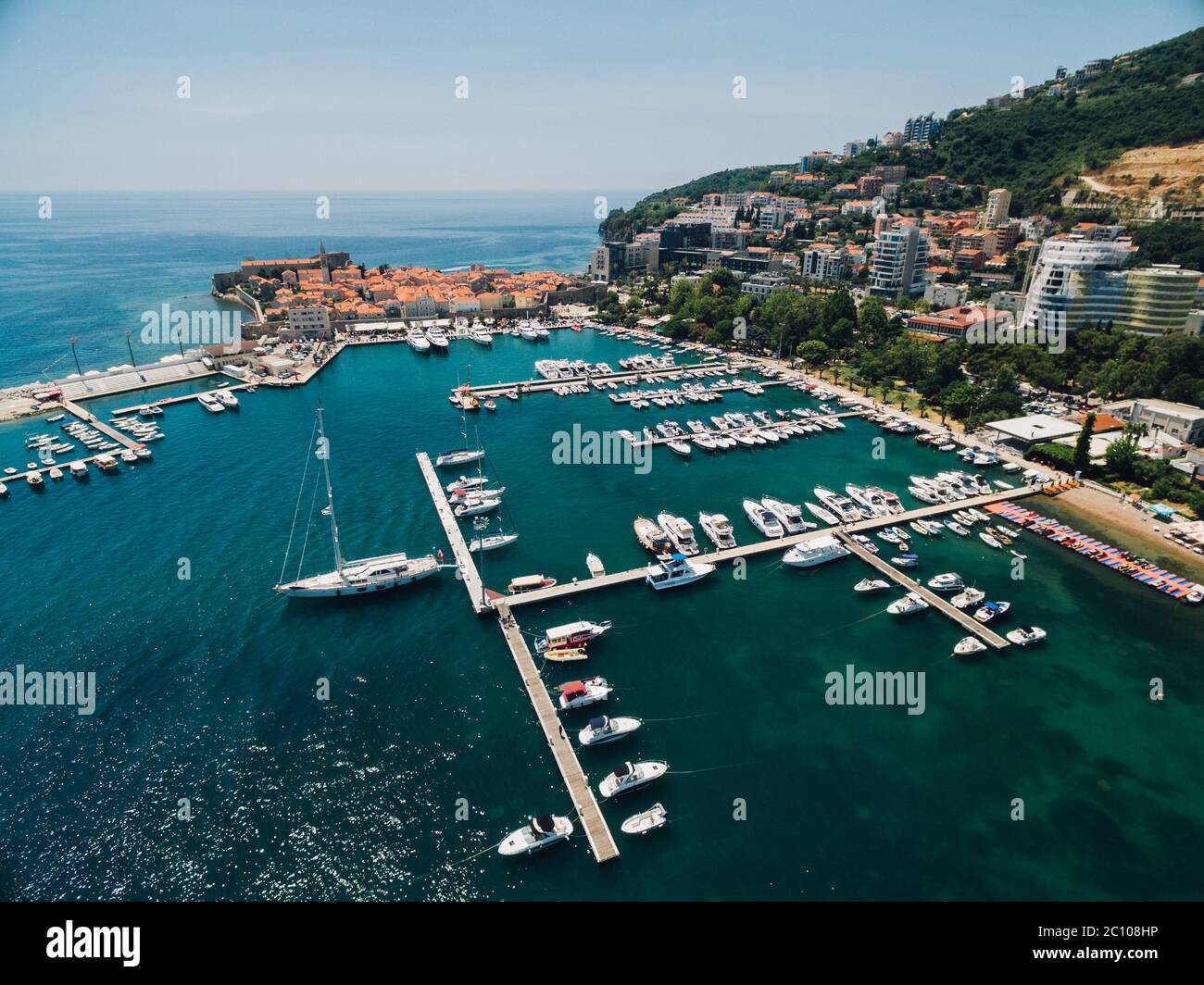 Boat dock and yacht port in Budva, Montenegro. Aerial photo from the ...