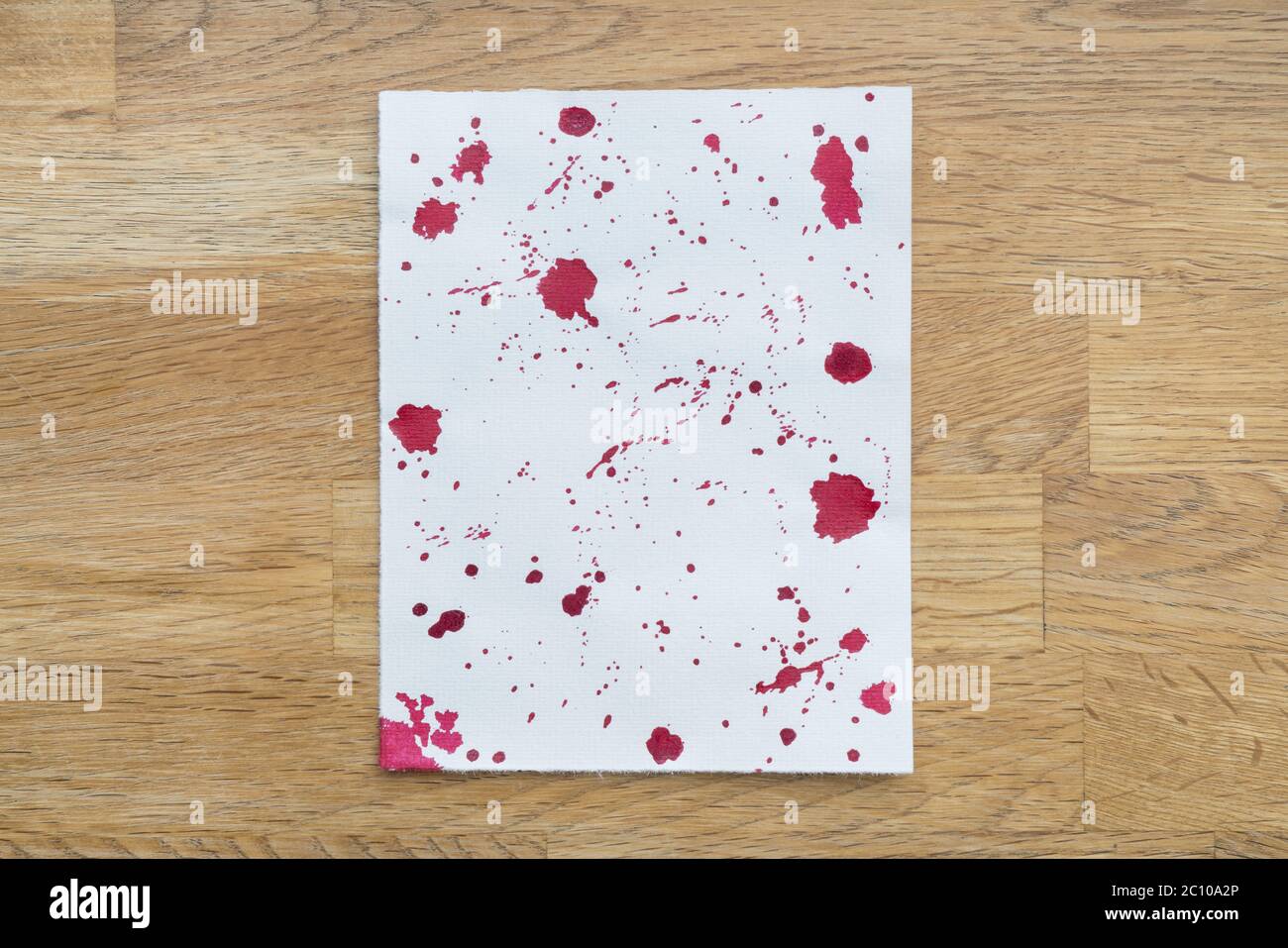 Paint splattered piece of paper hi-res stock photography and images - Alamy