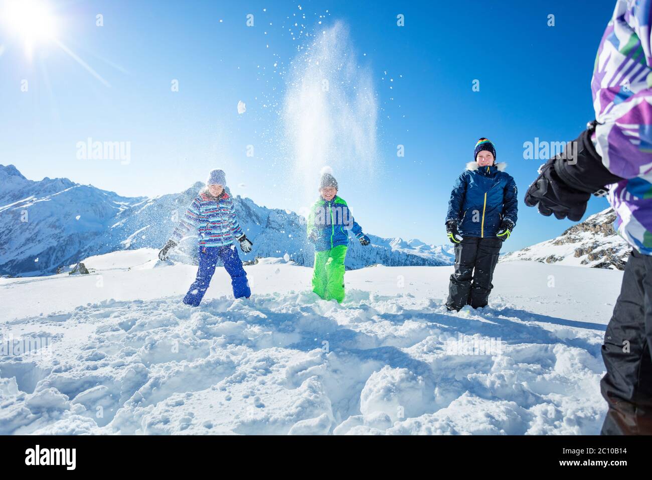 Snowball fight children hi-res stock photography and images - Alamy
