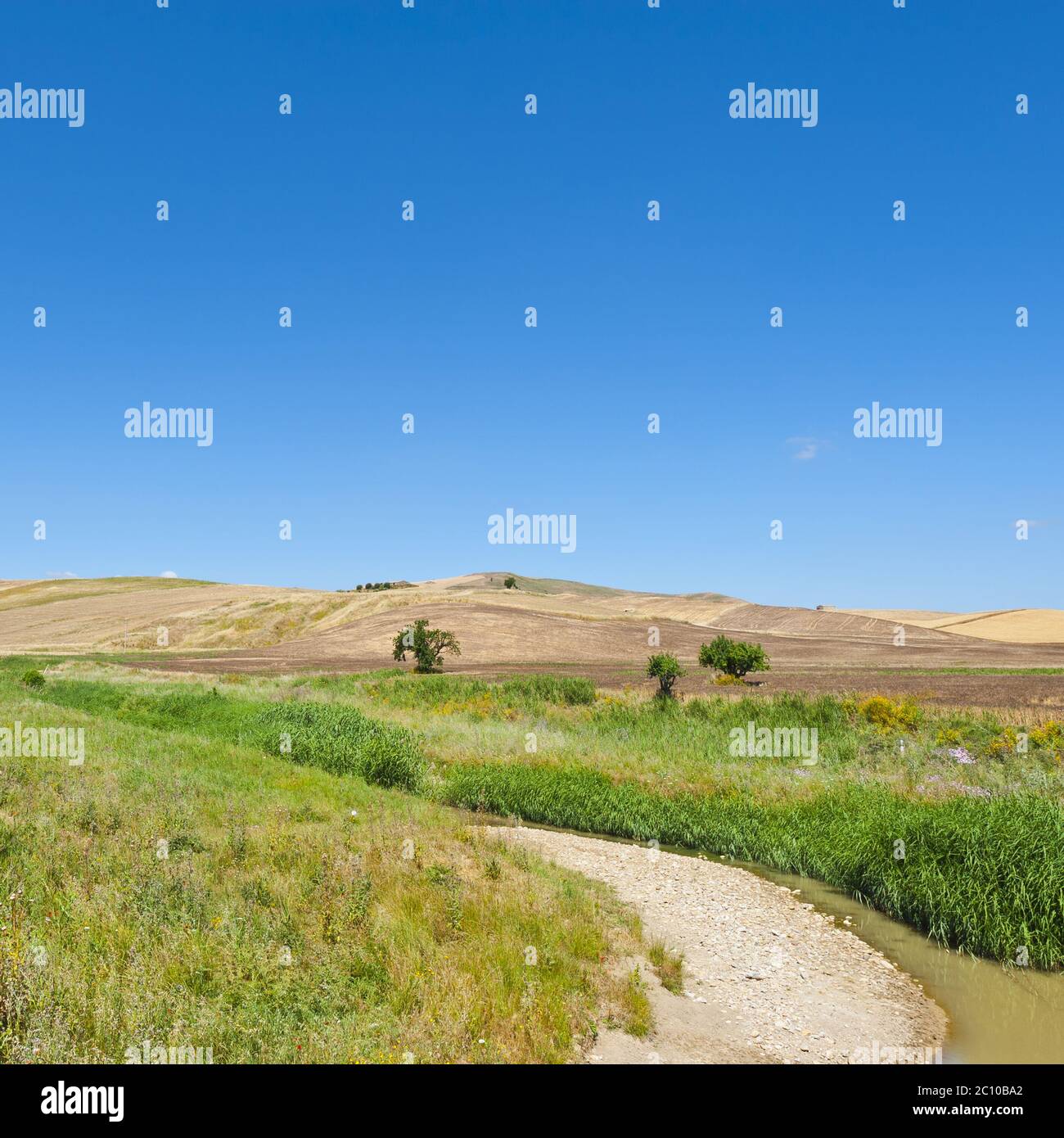 River between Hills Stock Photo - Alamy