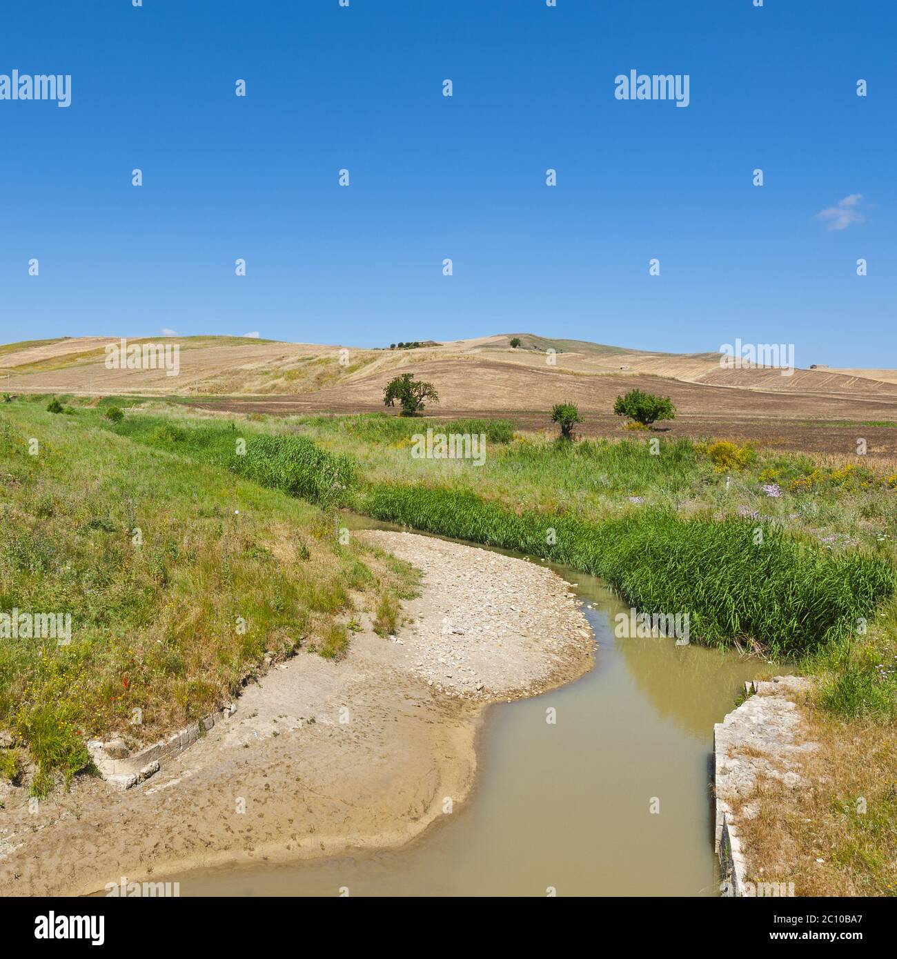 River between Hills Stock Photo - Alamy