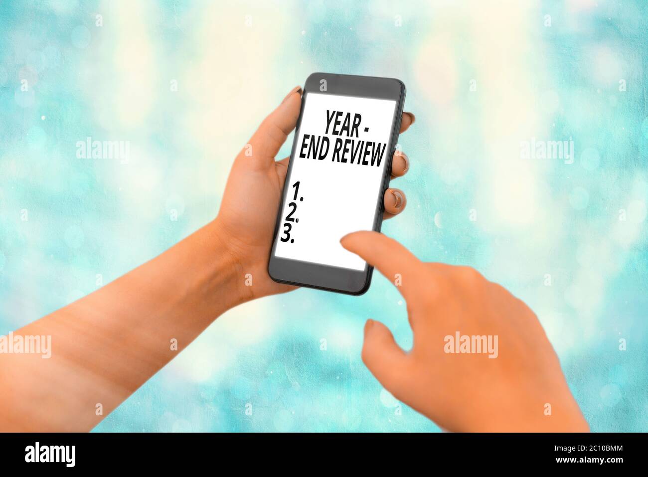 Writing note showing Year end Review. Business concept for annual assessment of achievement and ...