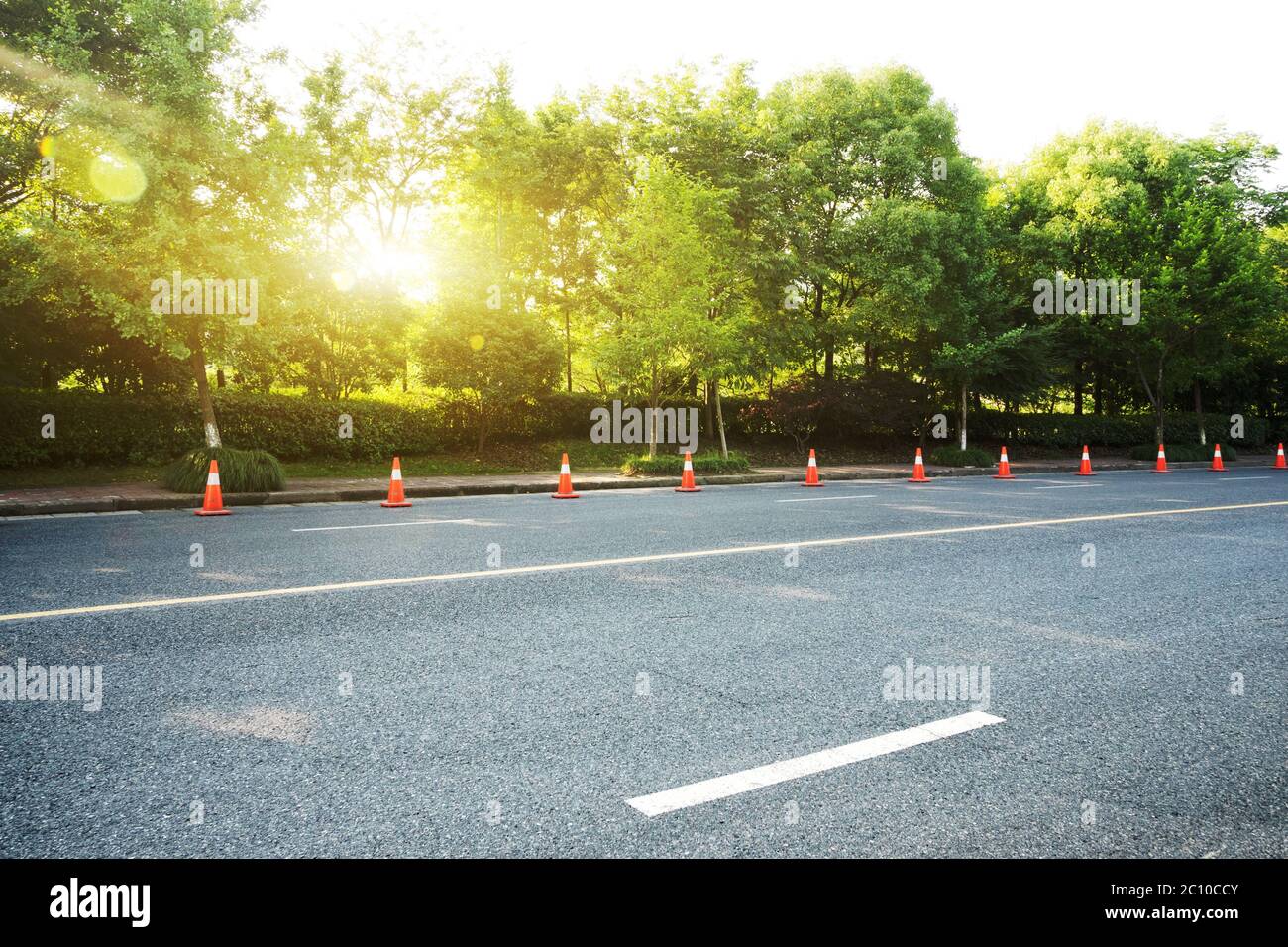 empty rural asphalt road at sunrise Stock Photo - Alamy
