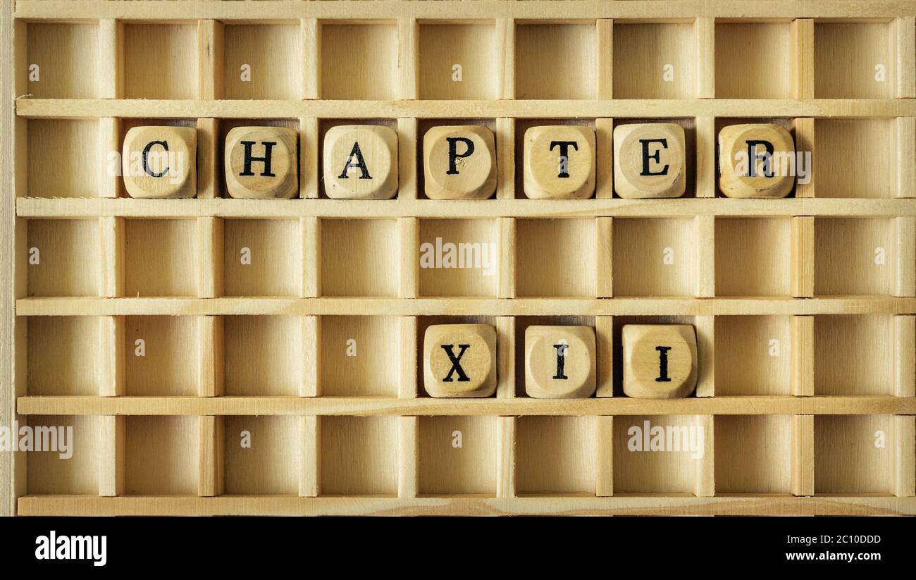 wooden game with the word chapter twelve Stock Photo - Alamy