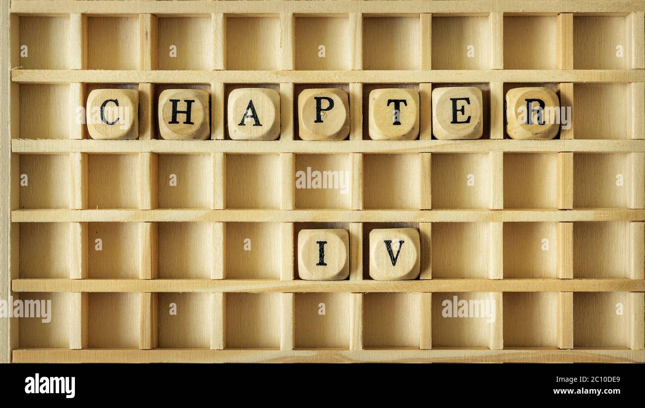 wooden game with the word chapter four Stock Photo - Alamy
