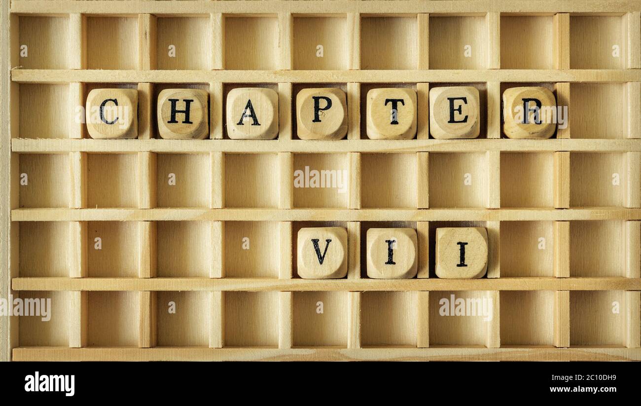 wooden game with the word chapter seven Stock Photo - Alamy