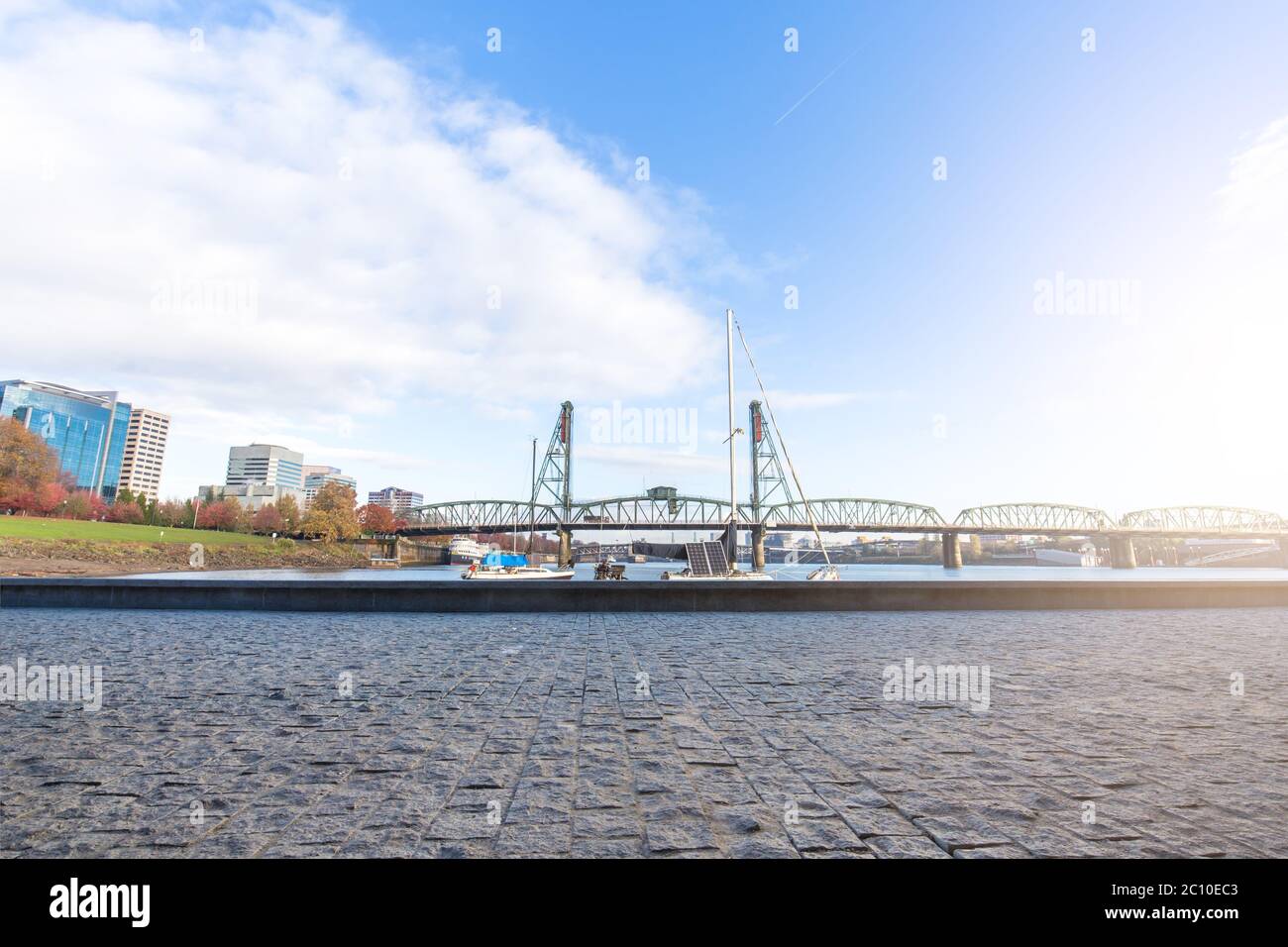 stone floor with steel bridge in portland Stock Photo - Alamy