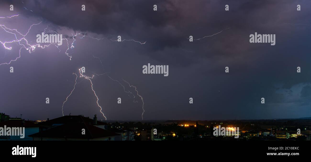 Dramatic lightning storm houses hi-res stock photography and images - Alamy
