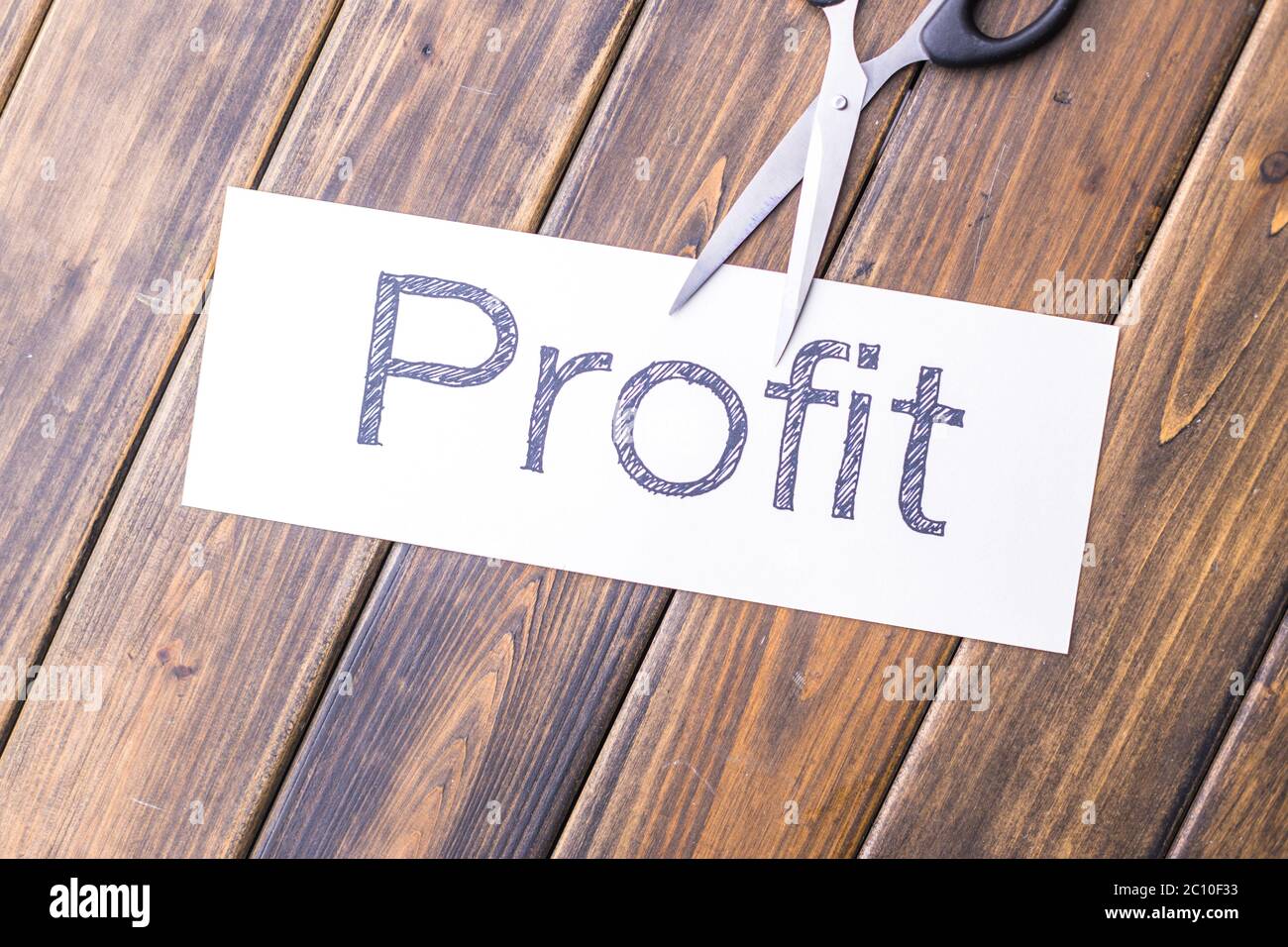cut paper with word profit by scissors Stock Photo - Alamy
