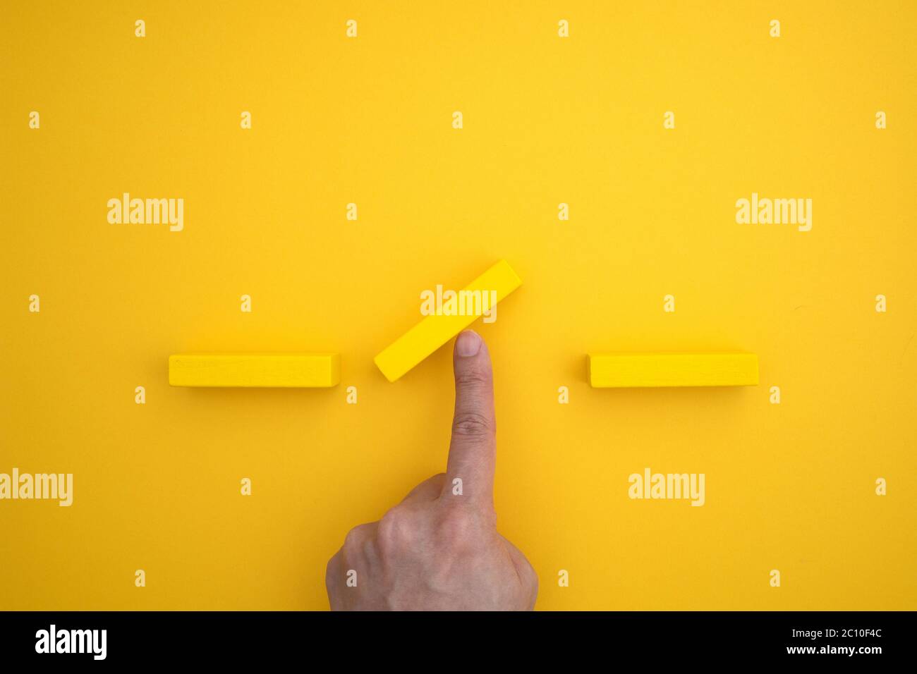 break and disturb the middle of a yellow-block bridge Stock Photo - Alamy