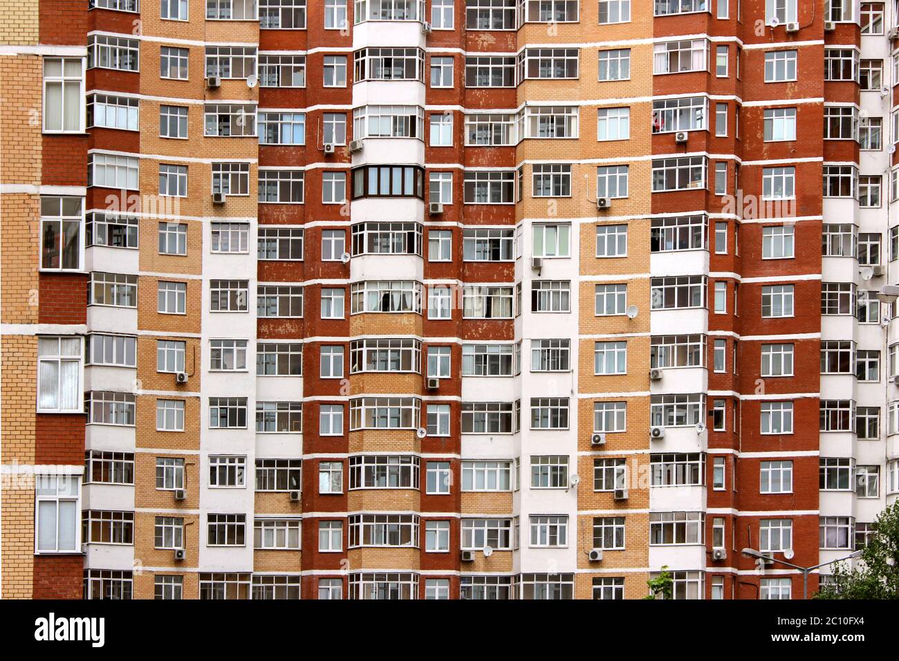 texture of an apartment building with many windows Stock Photo - Alamy