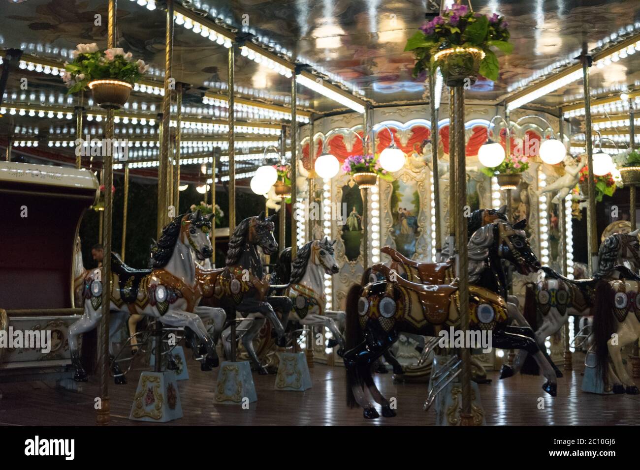 empty merry-go-round at night in carnival switzerland Stock Photo - Alamy