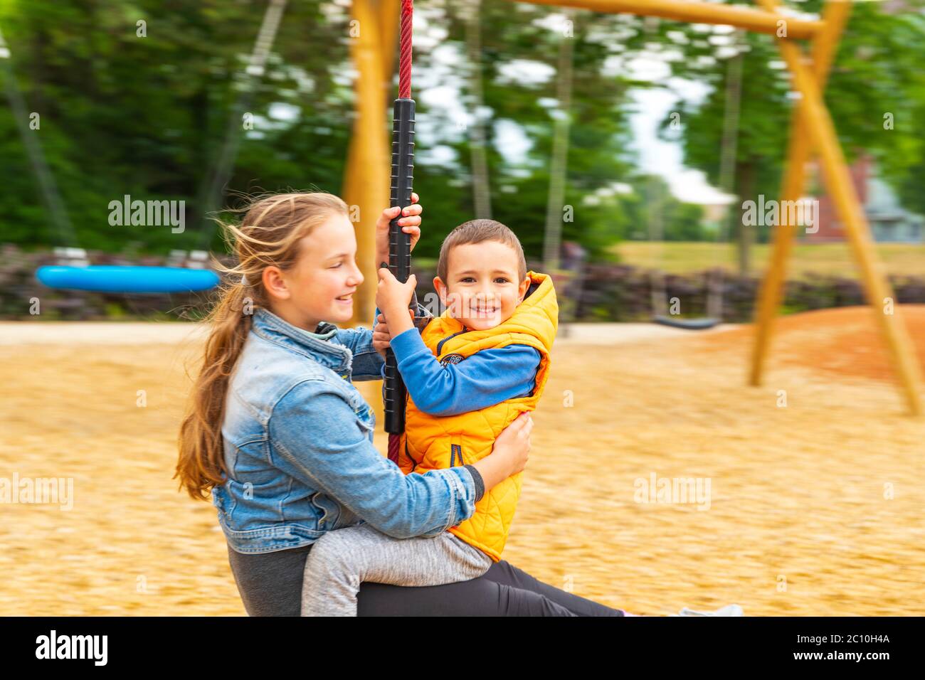 Happy children playing and having fun at playground. Cute children ...