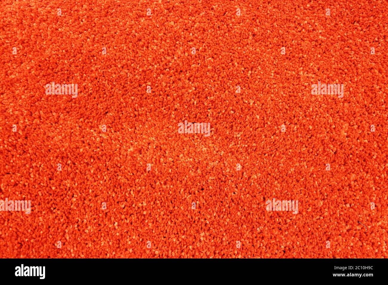 background carpet a uniform orange color Stock Photo - Alamy