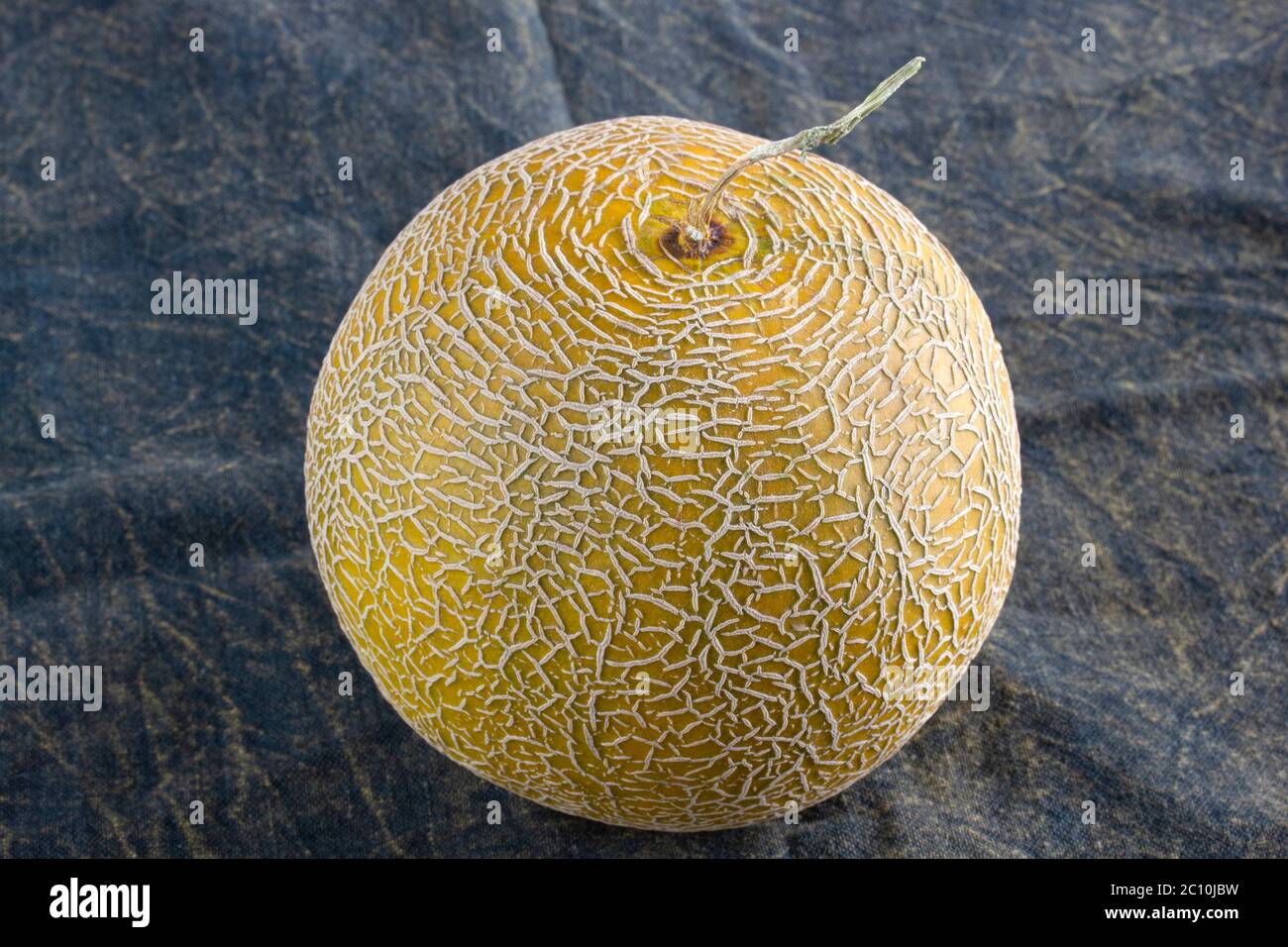 sweet and juicy whole melons Stock Photo - Alamy