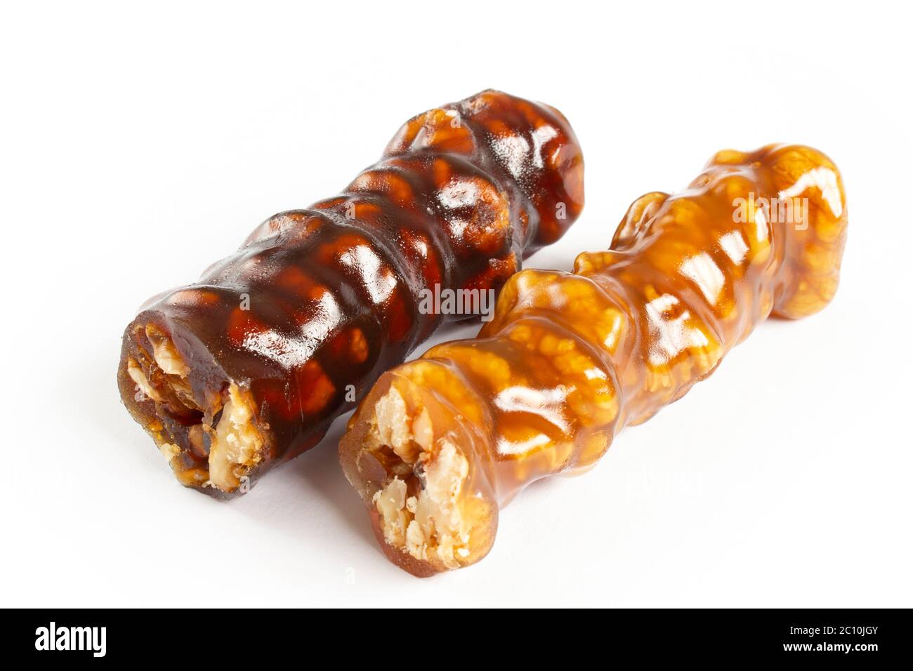 Walnuts on a string dipped in starch grape molasses. Churchkhela ...