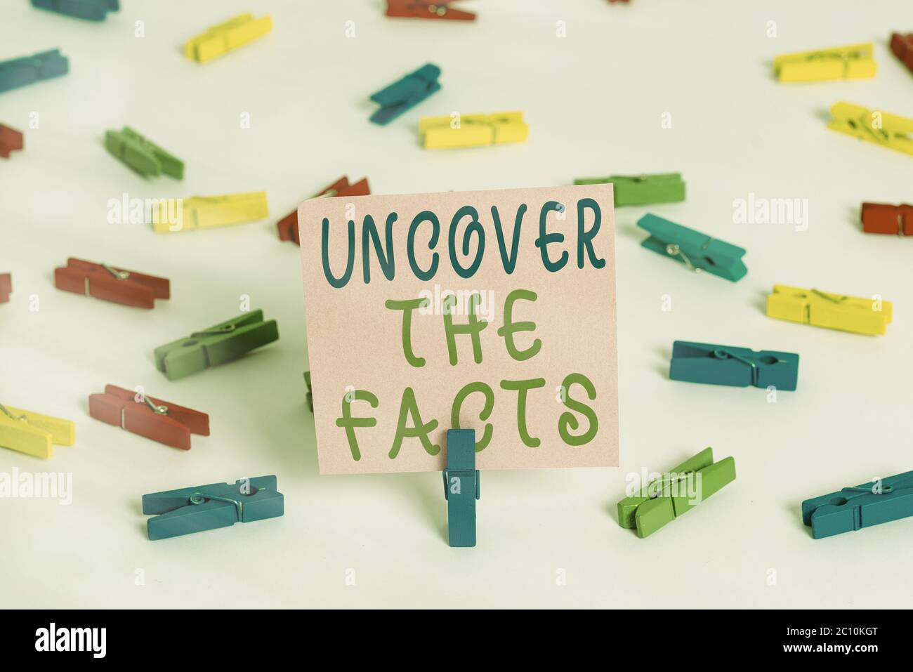 Writing note showing Uncover The Facts. Business concept for Find the ...
