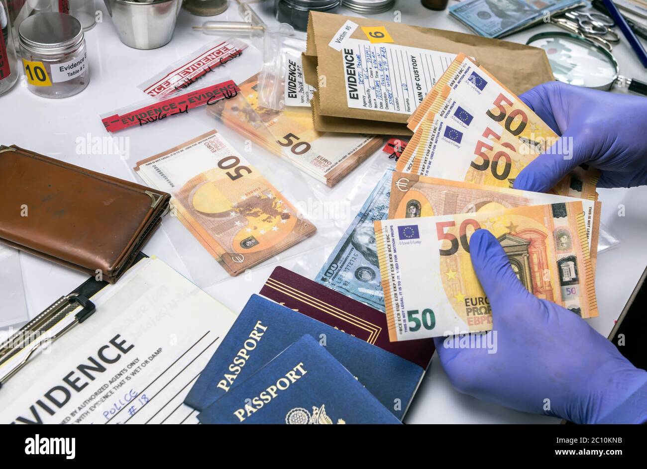 American passport and money of a evidence bag in laboratory of ...