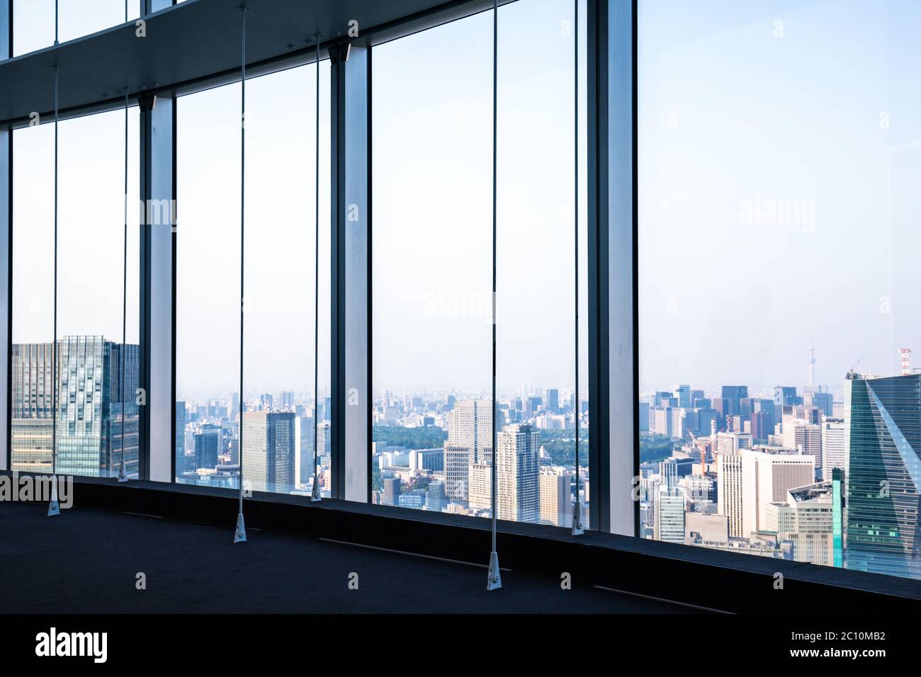 downtown of tokyo through glass window Stock Photo - Alamy