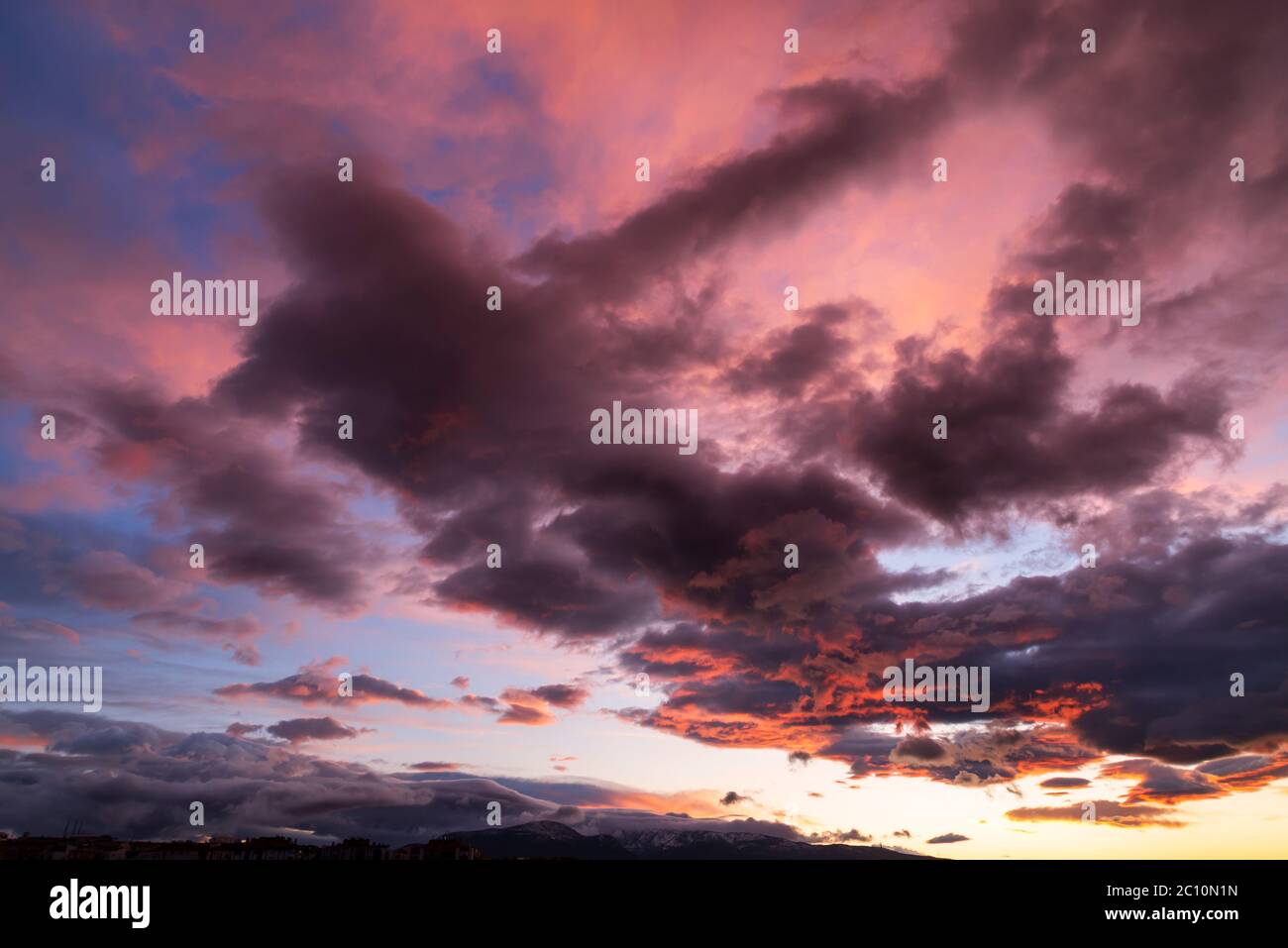 Cloudy and moody sky with beautiful colors of early morning before ...