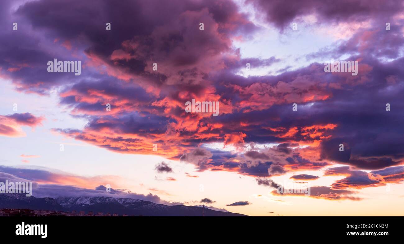 Cloudy and moody sky with beautiful colors of early morning before ...