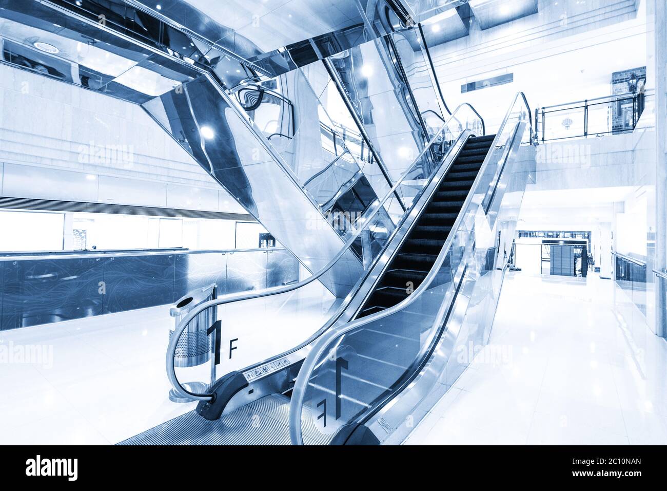 elegant escalator in modern shopping mall Stock Photo - Alamy