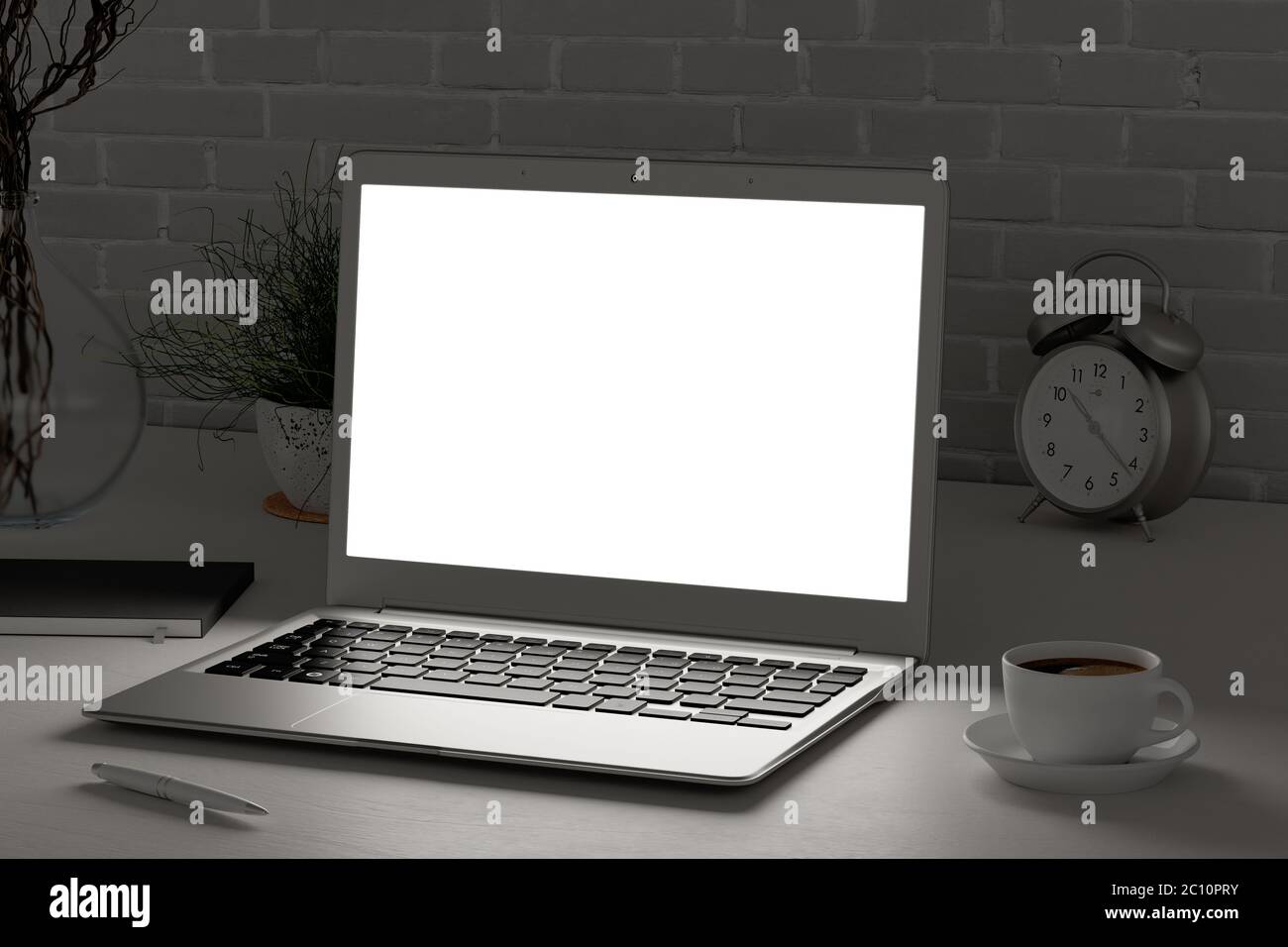 Workplace with glowing laptop screen at evening mock up. White desk and ...