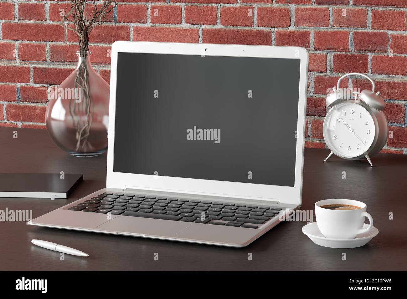 Workplace with laptop mock up. Dark wooden desk and red brick wall ...