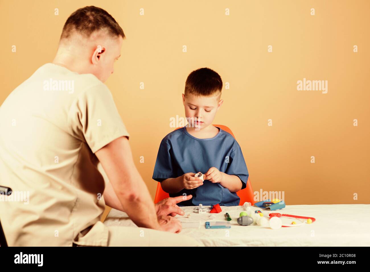 Medical service. Analysis laboratory. Kid little doctor sit table ...
