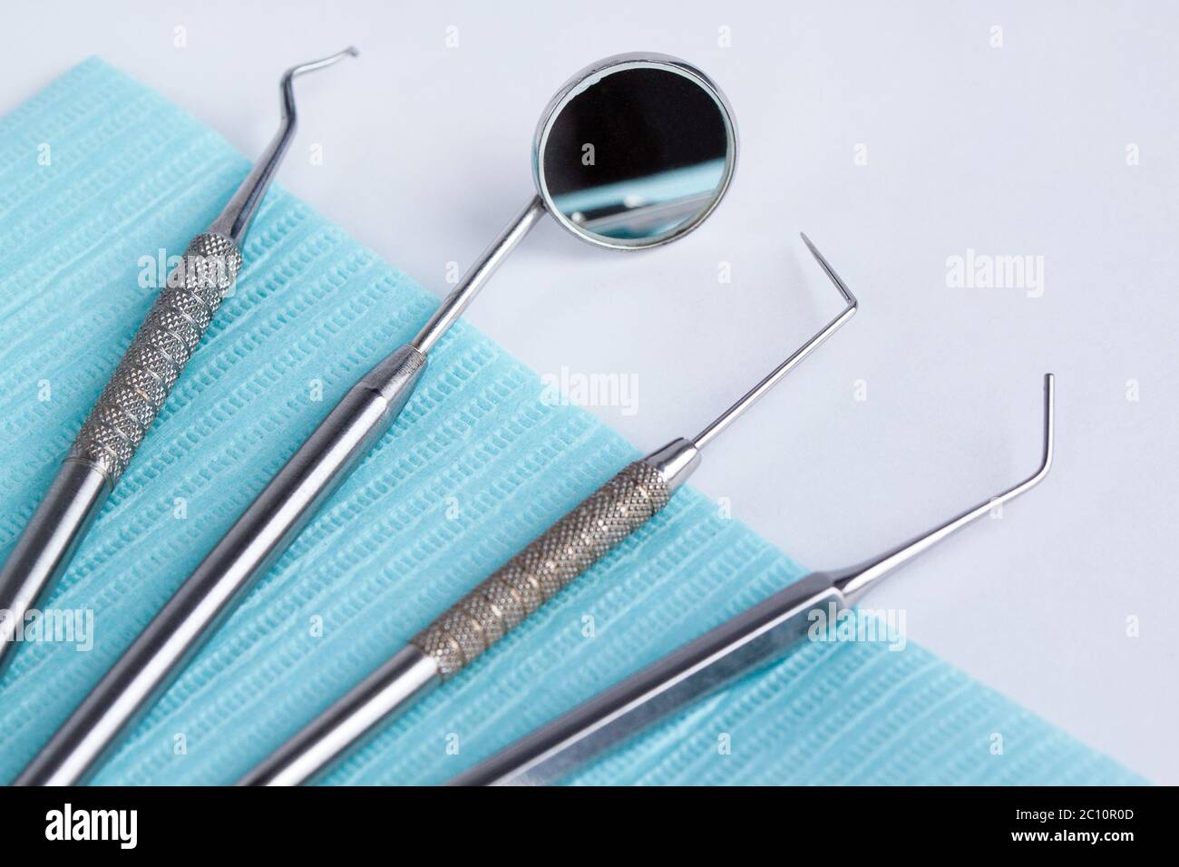 Group of dental tools for the treatment of teeth. Isolated on white ...