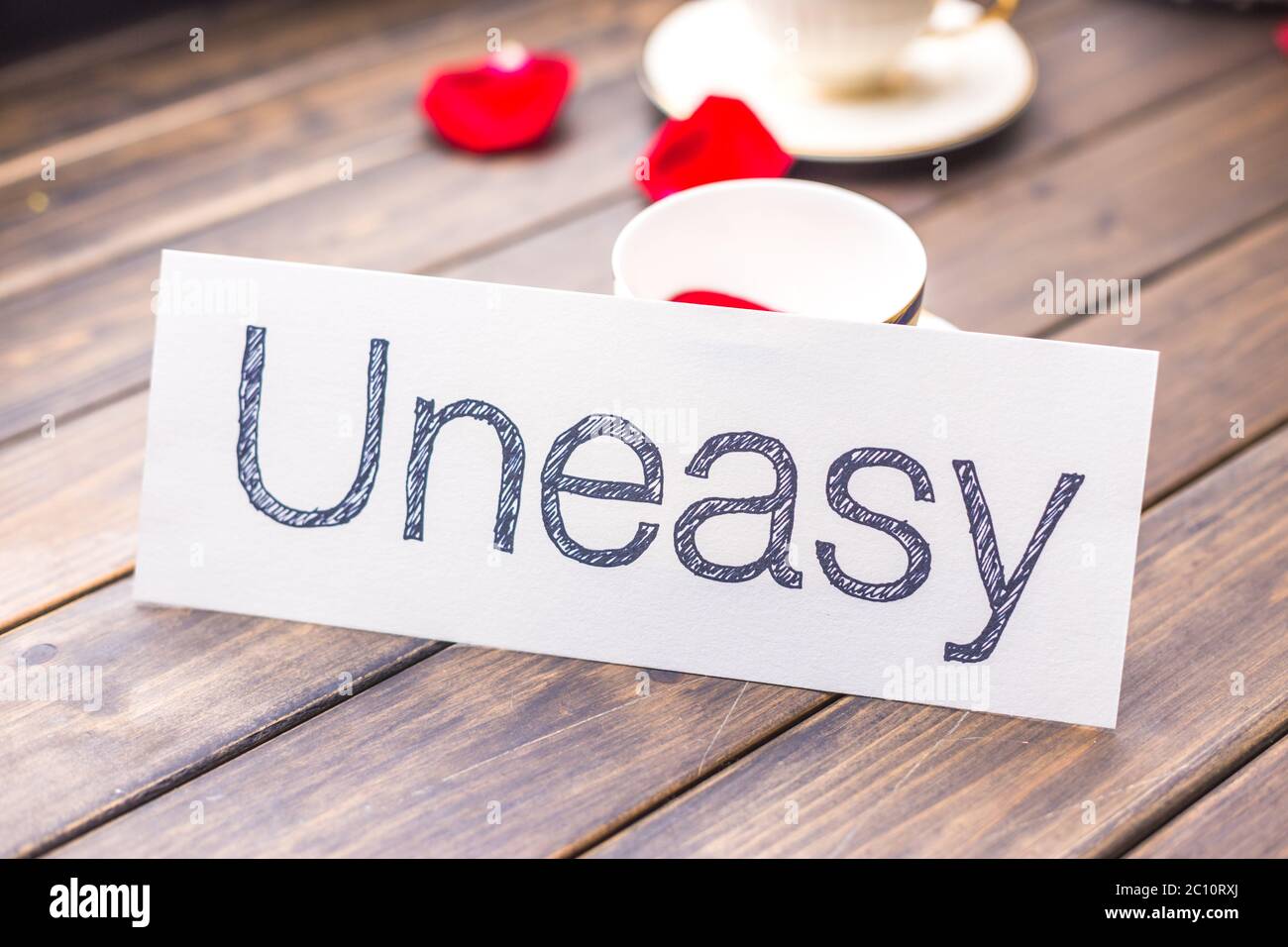 Uneasy hi-res stock photography and images - Alamy