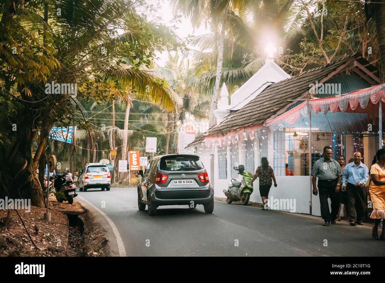 Goa, India. Car Of Suzuki Moving On Street In Sunny Summer Day Stock ...
