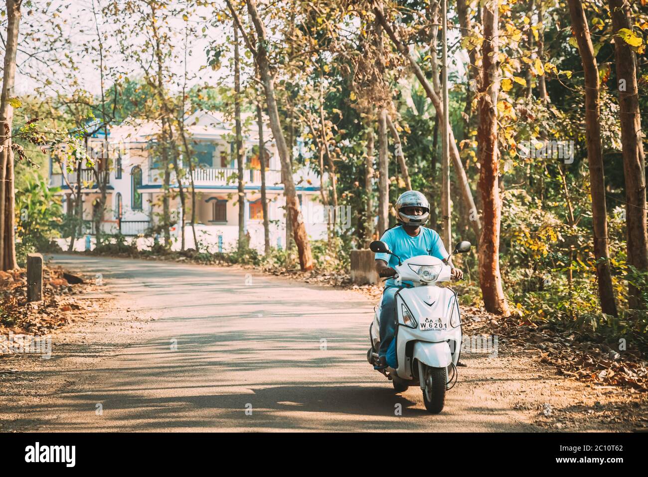 Indian man on bike hi-res stock photography and images - Alamy