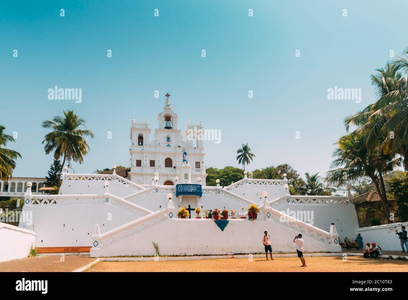 Panaji, Goa, India. People Walking Near Our Lady Of The Immaculate ...