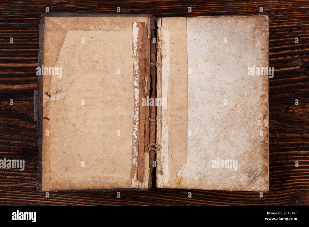 Old open book Stock Photo - Alamy