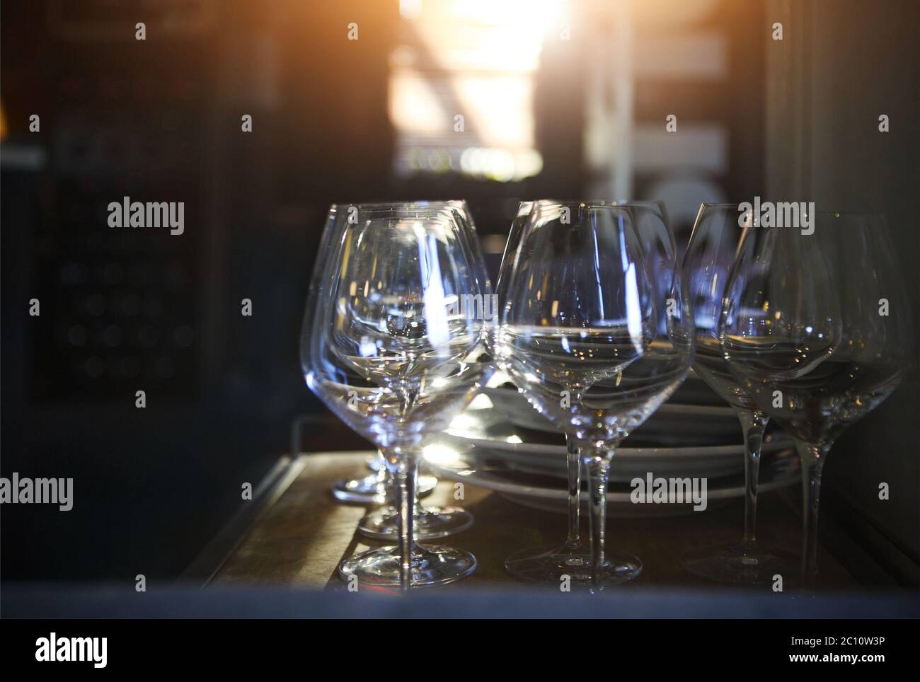 Empty glasses and plates in restaurant Stock Photo - Alamy