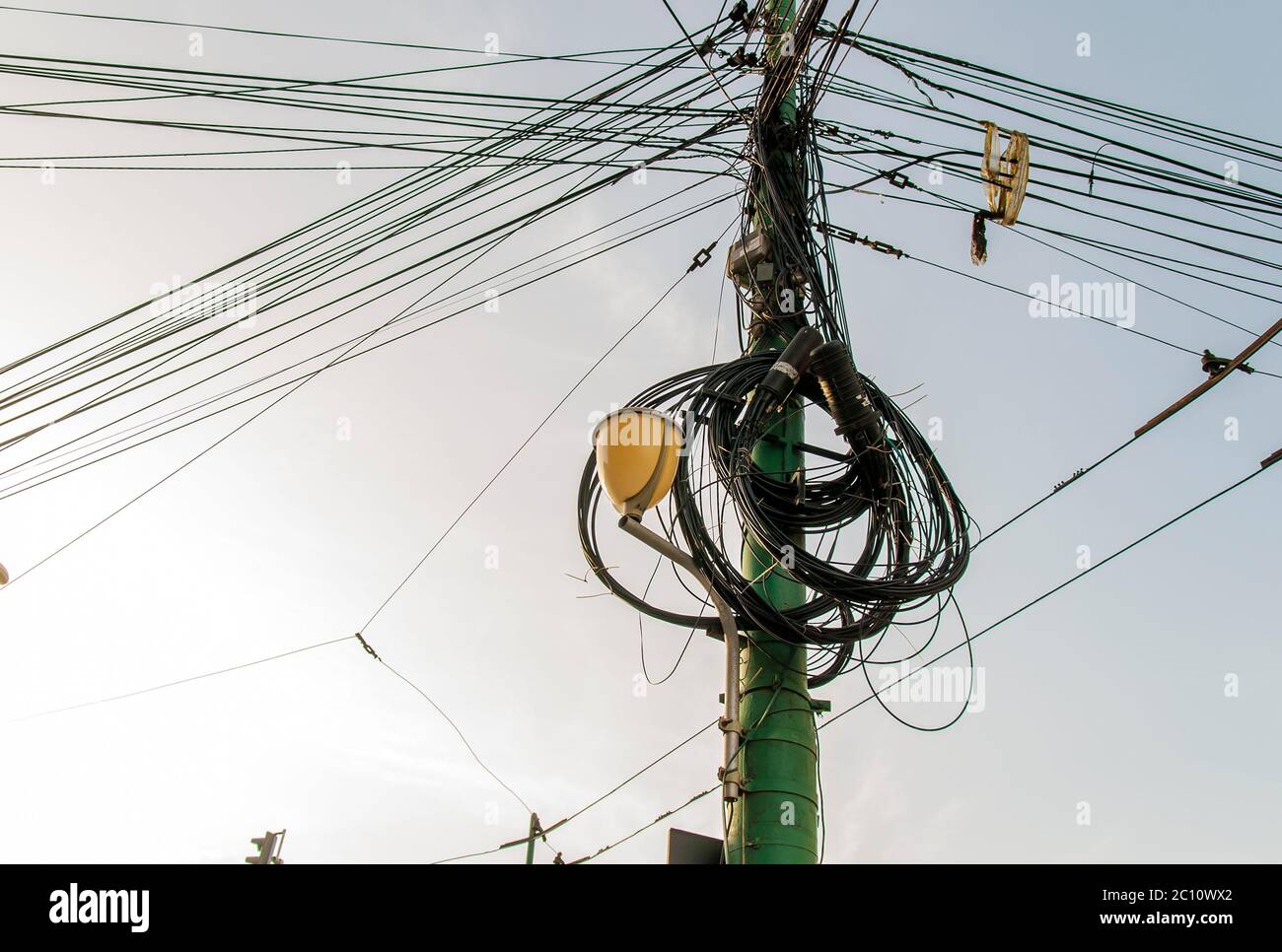 Electricity pole and street light complicated wiring on the pole Stock ...
