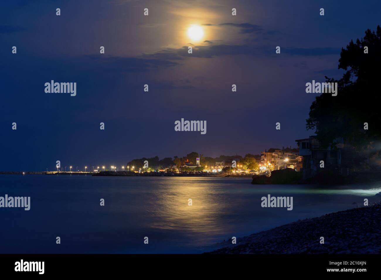 Moon over village hi-res stock photography and images - Alamy